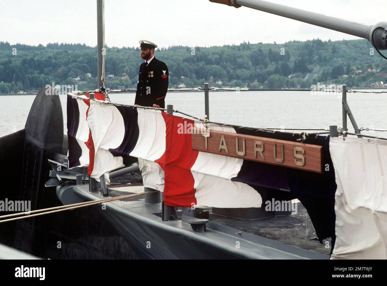 Puget Sound Naval Shipyard, Bremerton, Washington. A crewmember of the ...