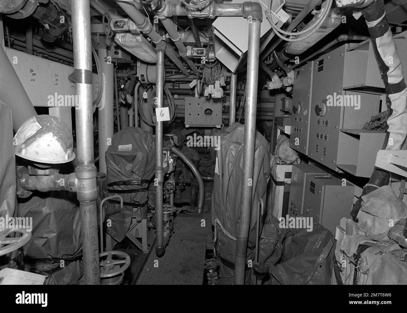 The No. 2 lower level auxiliary machinery room aboard the guided ...