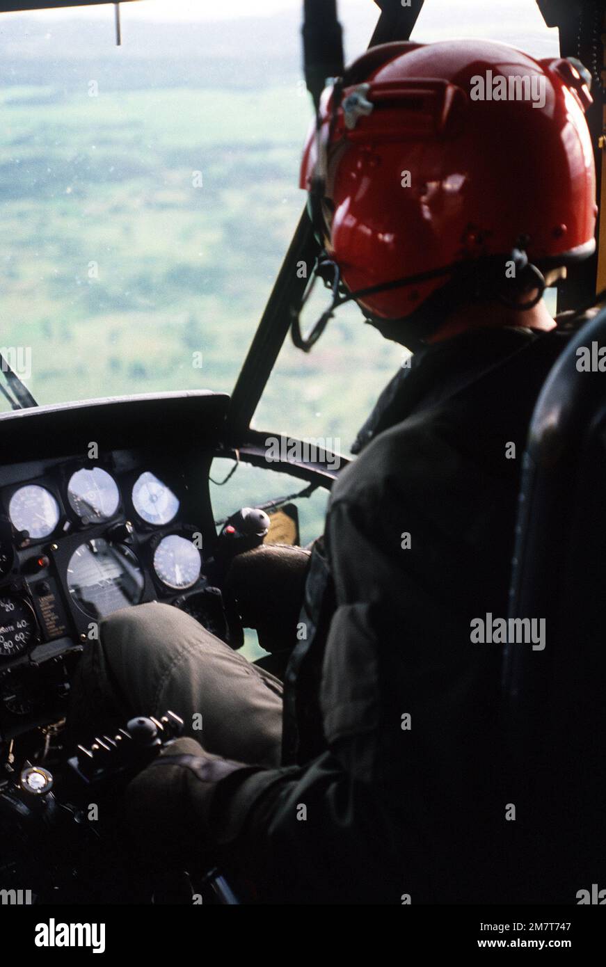 An interior view of the cokpit of an SH-3 Sea King helicopter from ...