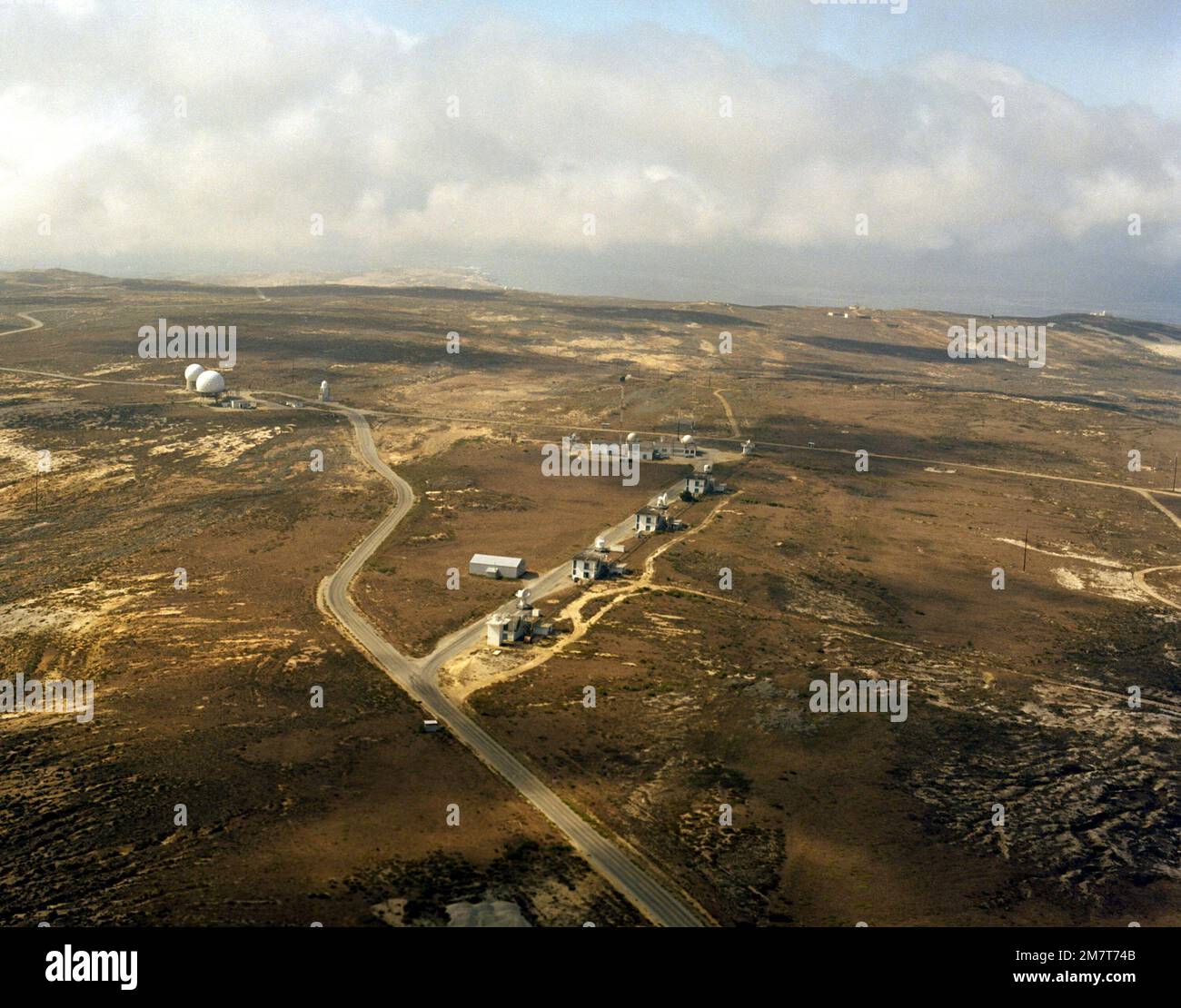 An aerial view of San Nicolas Island with FPS-16 and FPQ-10 antennas ...