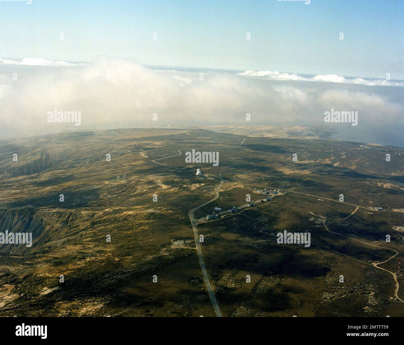 An aerial view of San Nicolas Island with three FPS-16 and one FPQ-10 ...