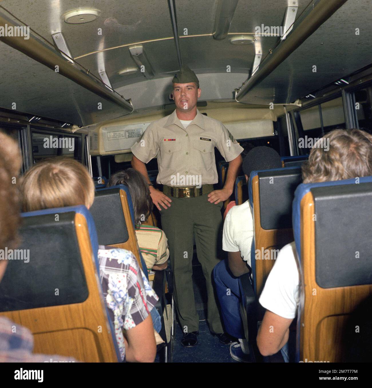 SGT Robert Dickerson, a Marine Corps drill instructor, welcomes a bus ...