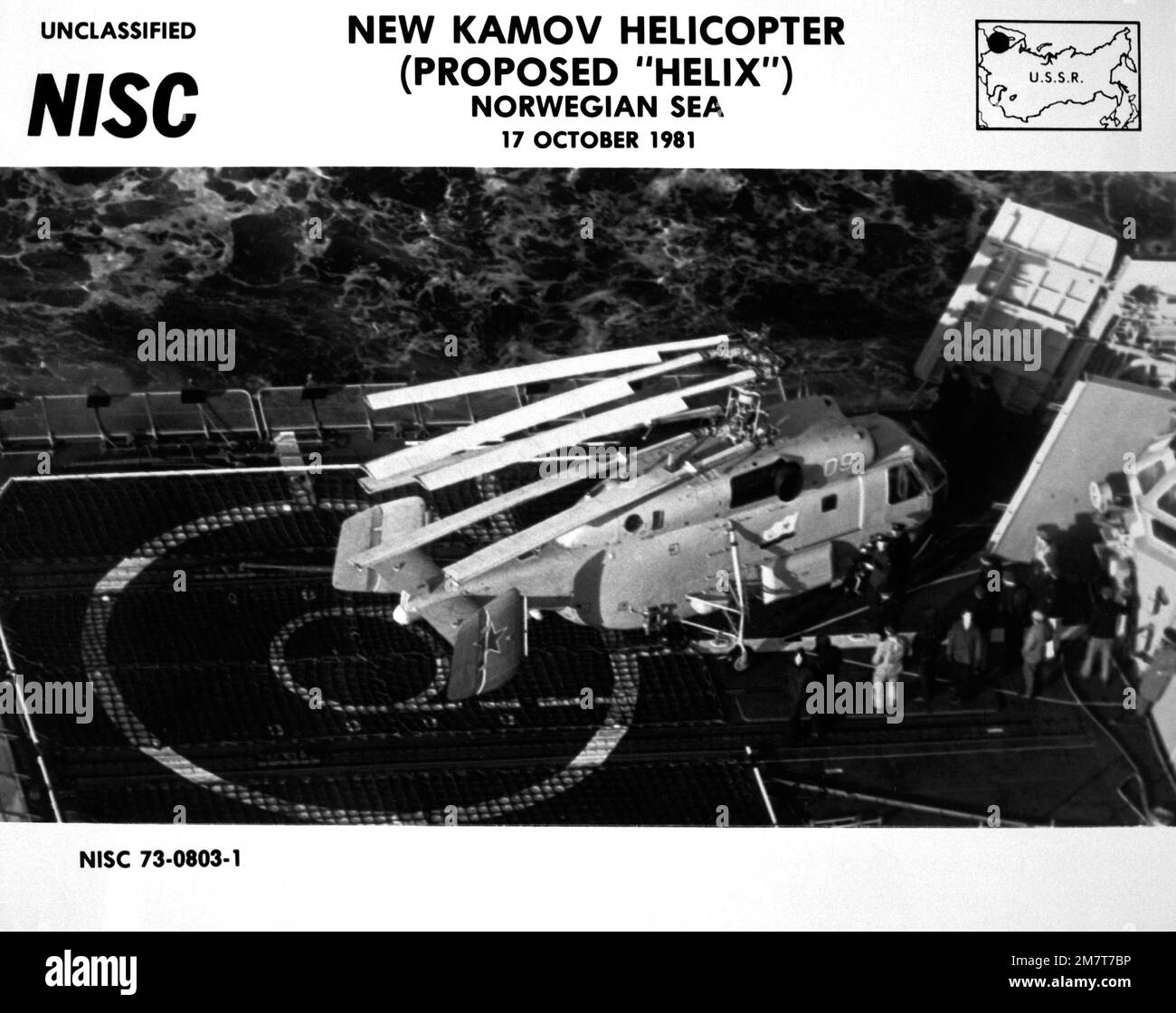 An aerial right rear view of a Soviet Helix helicopter, with rotor ...