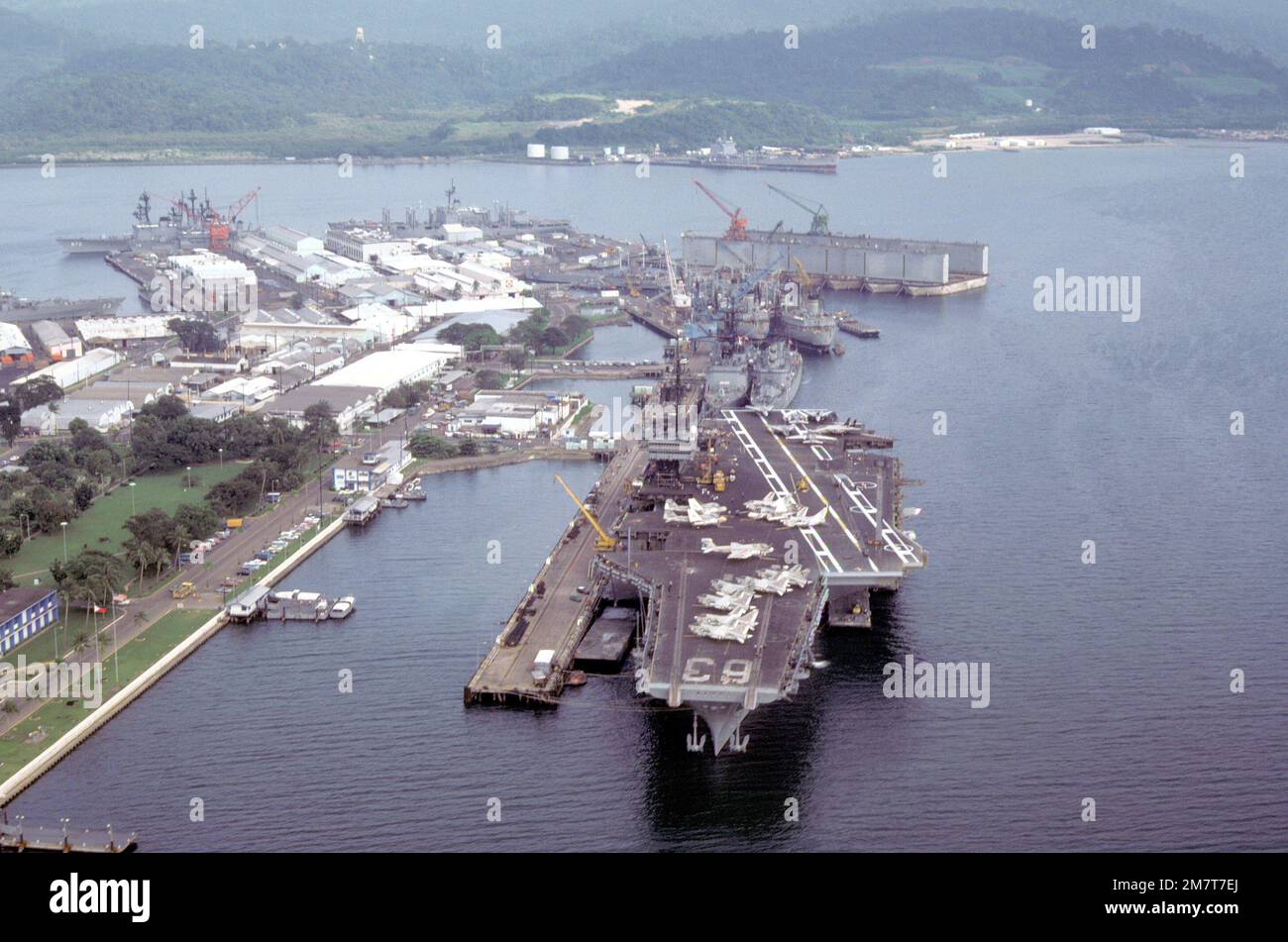 An aerial deck view, looking from bow to stern, of the aircraft carrier ...