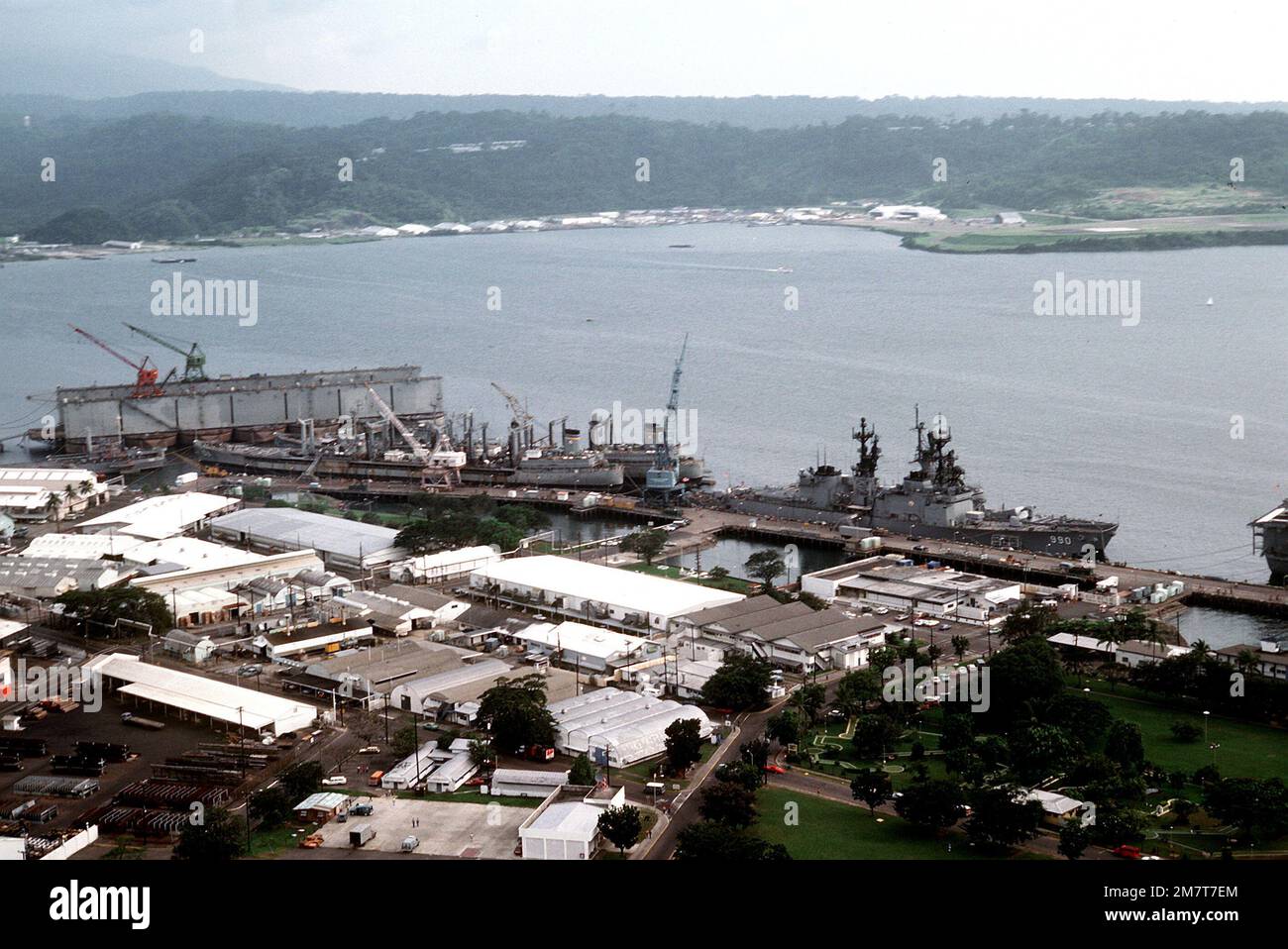 An aerial of the harbor with the oilers USNS NAVASOTA (T-AO-06) and ...