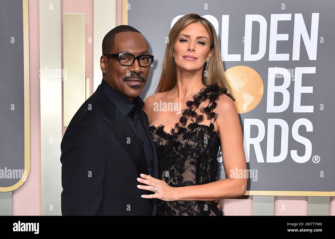 Eddie Murphy, left, and Paige Butcher arrive at the 80th annual Golden ...