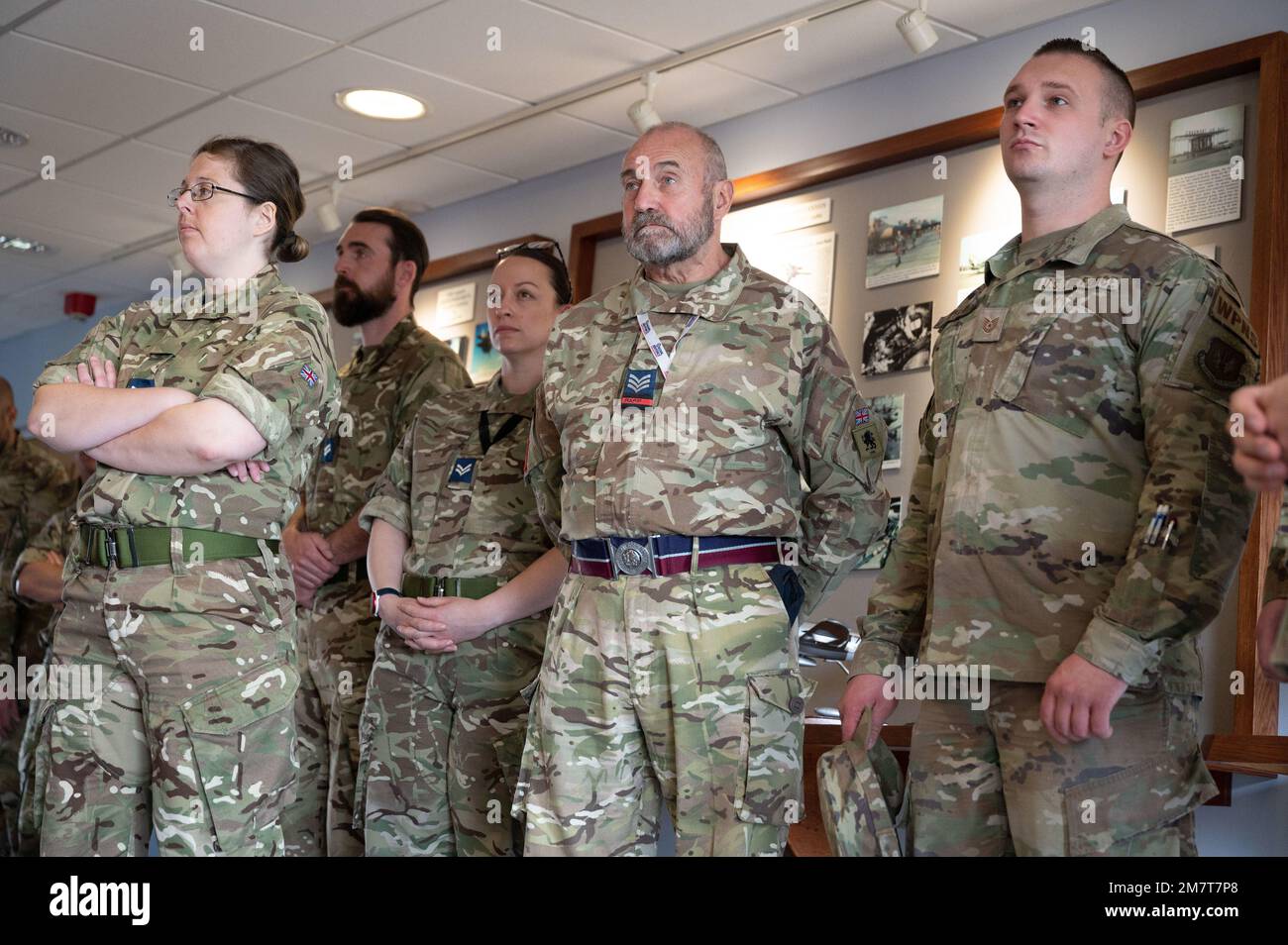 U.S. Air Force and Royal Air Force Airmen attend a historical briefing ...