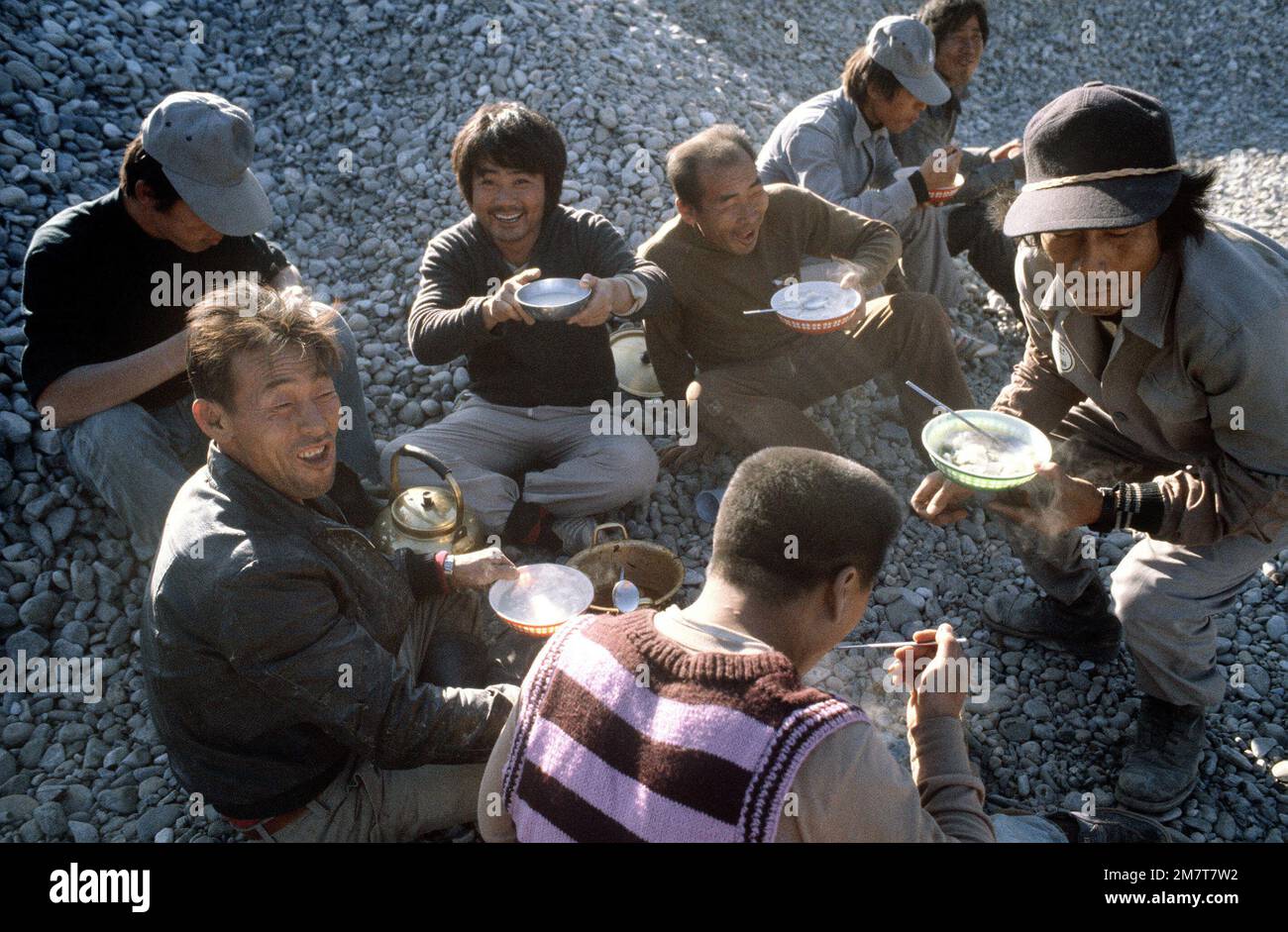 Korean workers take their lunch break from their construction work at ...