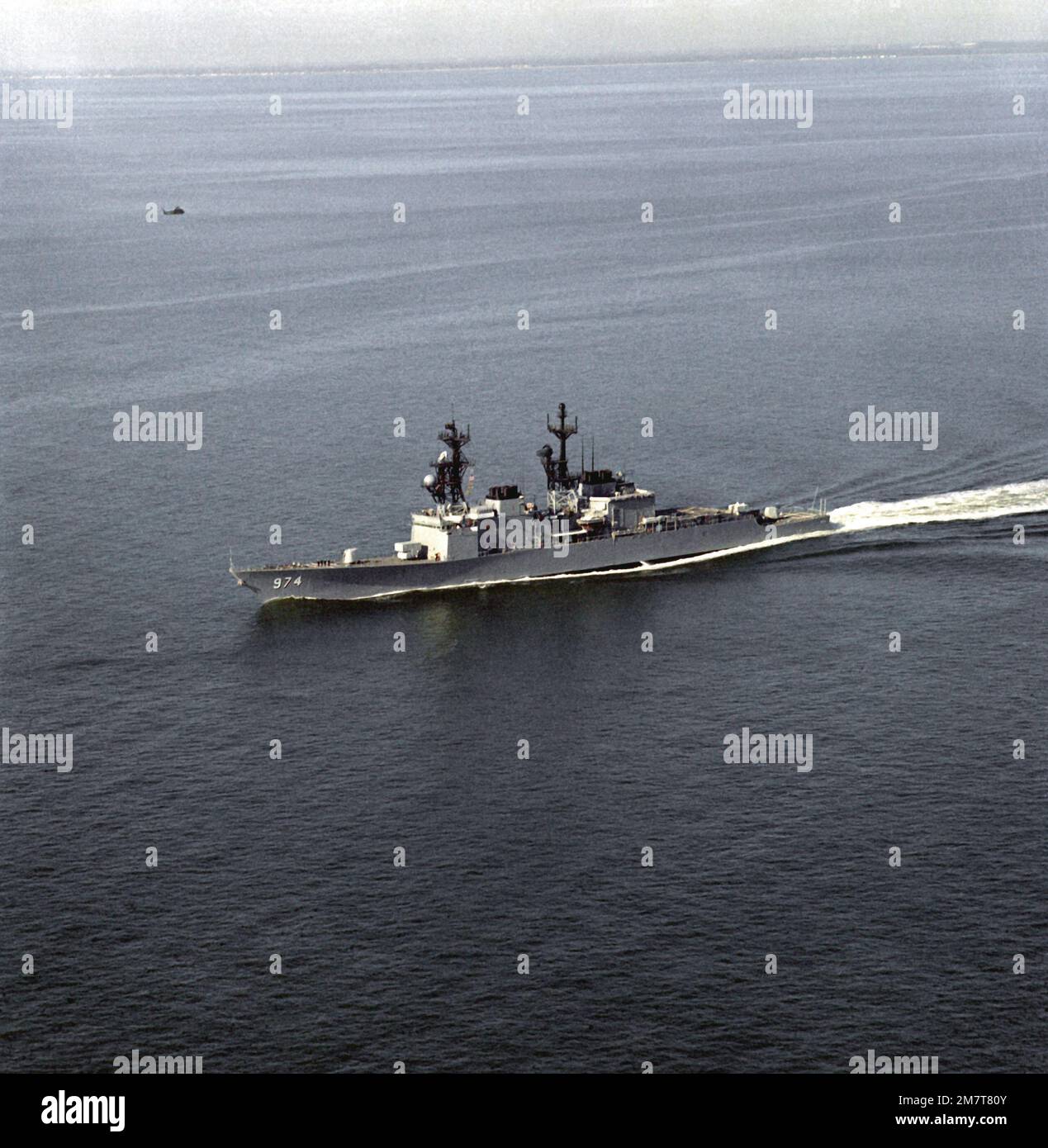 A port view of the destroyer USS COMTE DE GRASSE (DD-974) underway with ...