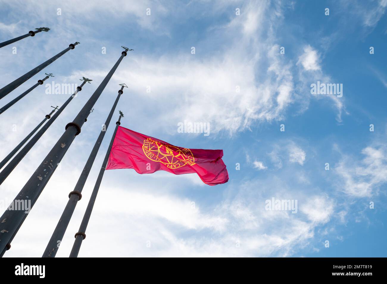 Flag of Cartagena, Murcia in the tourist city of Cartagena with moored ...