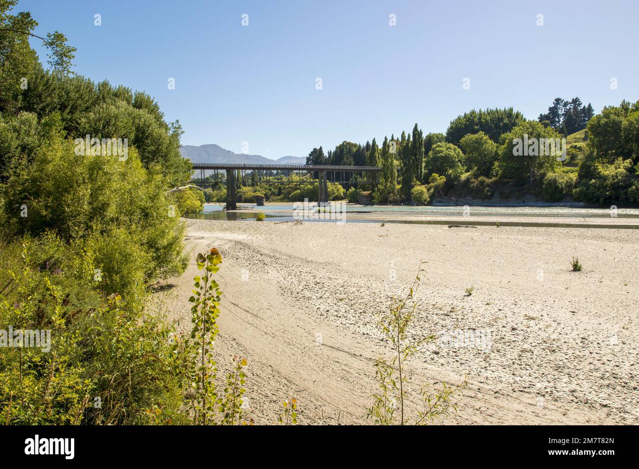 Iconic 1871 timber bridge over Shotover River, Queenstown, New Zealand ...