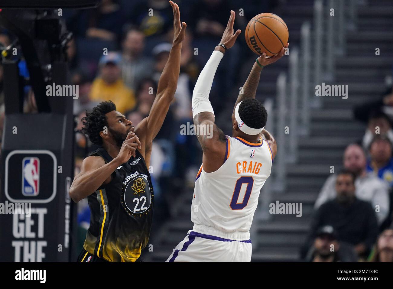 Phoenix Suns forward Torrey Craig, right, shoots over Golden State ...
