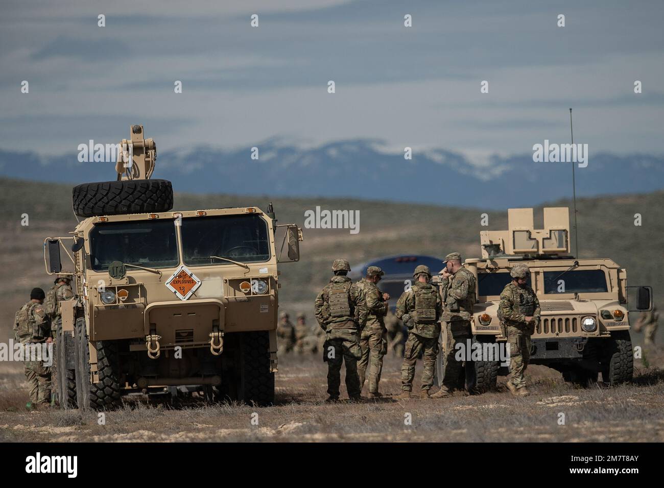 Charlie Company soldiers gather on the orchard Combat Training Center ...