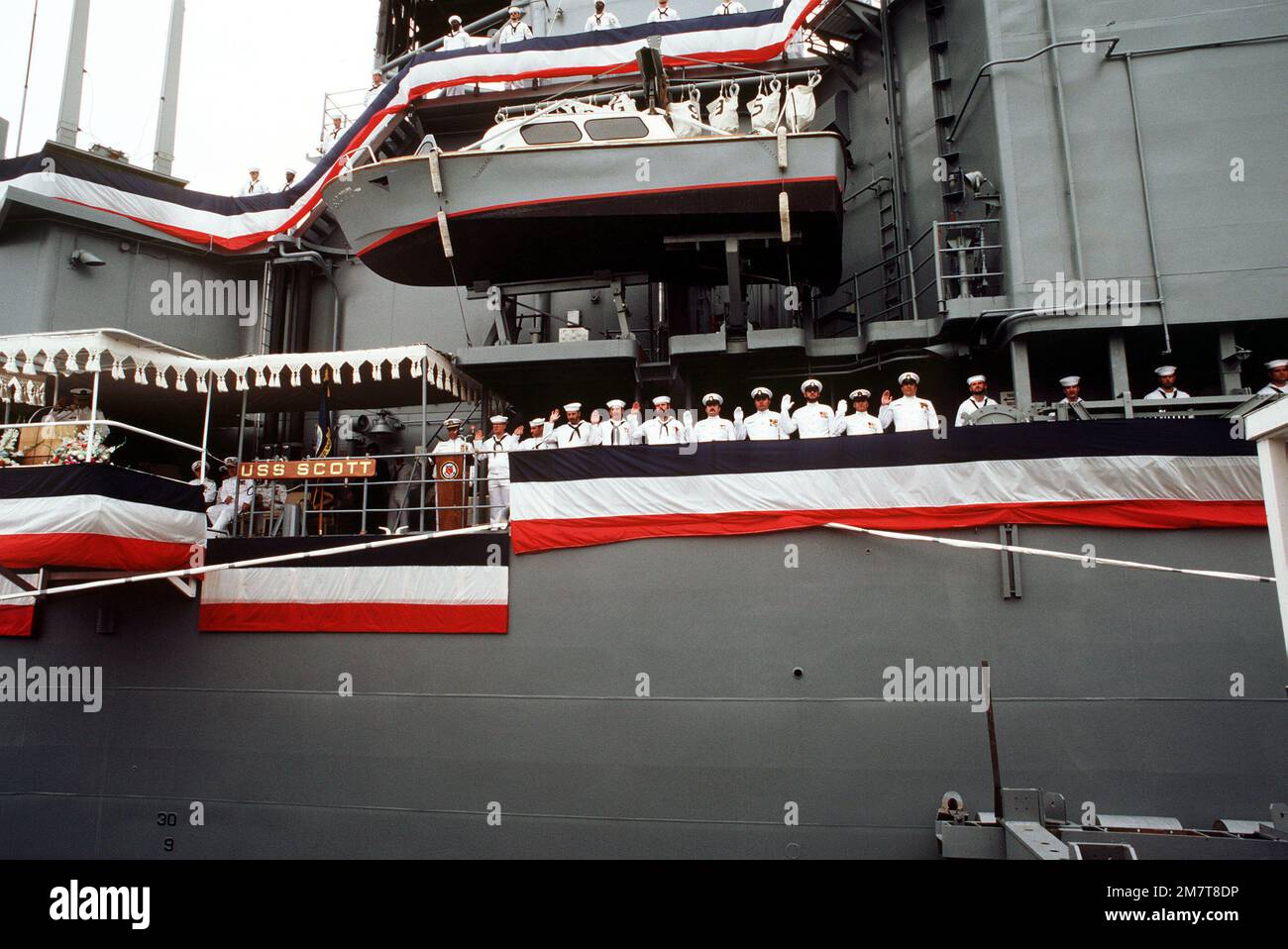 Reenlisting crew members of the guided missile destroyer USS SCOTT (DDG ...