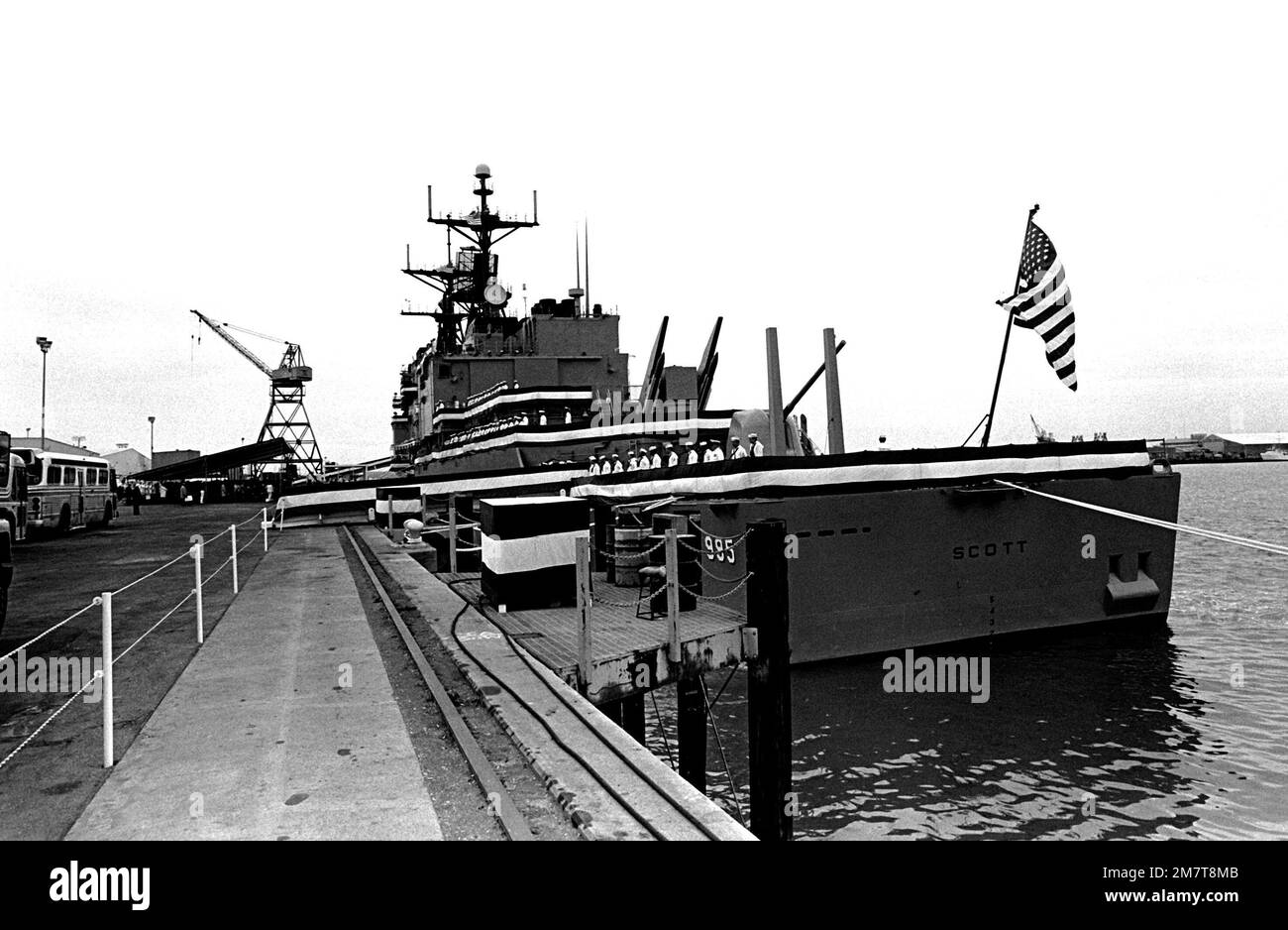 A stern view of the guided missile destroyer USS SCOTT (DDG-995) docked ...