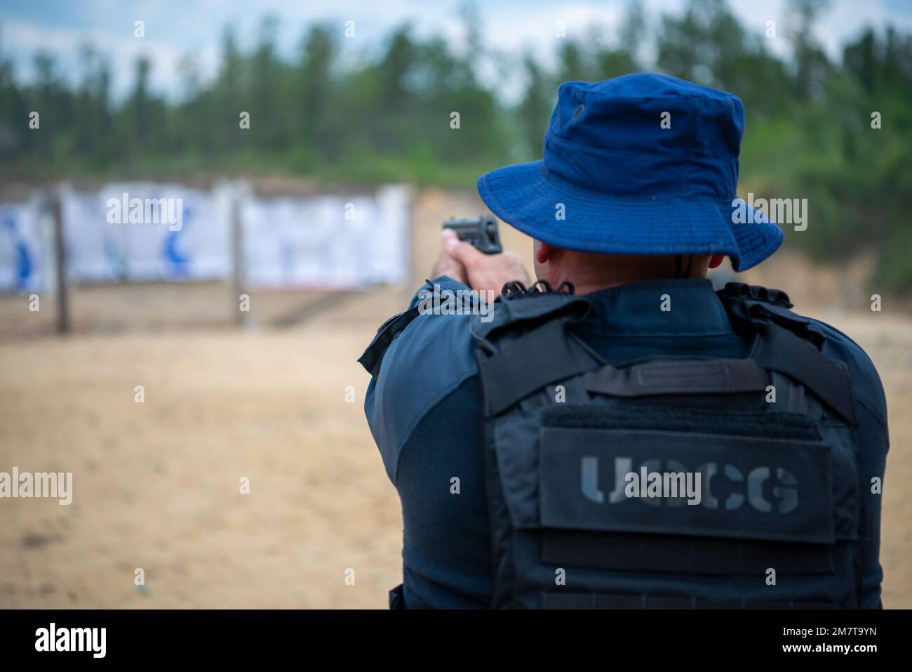 A Coast Guard Maritime Safety and Security New Orleans team member aims ...