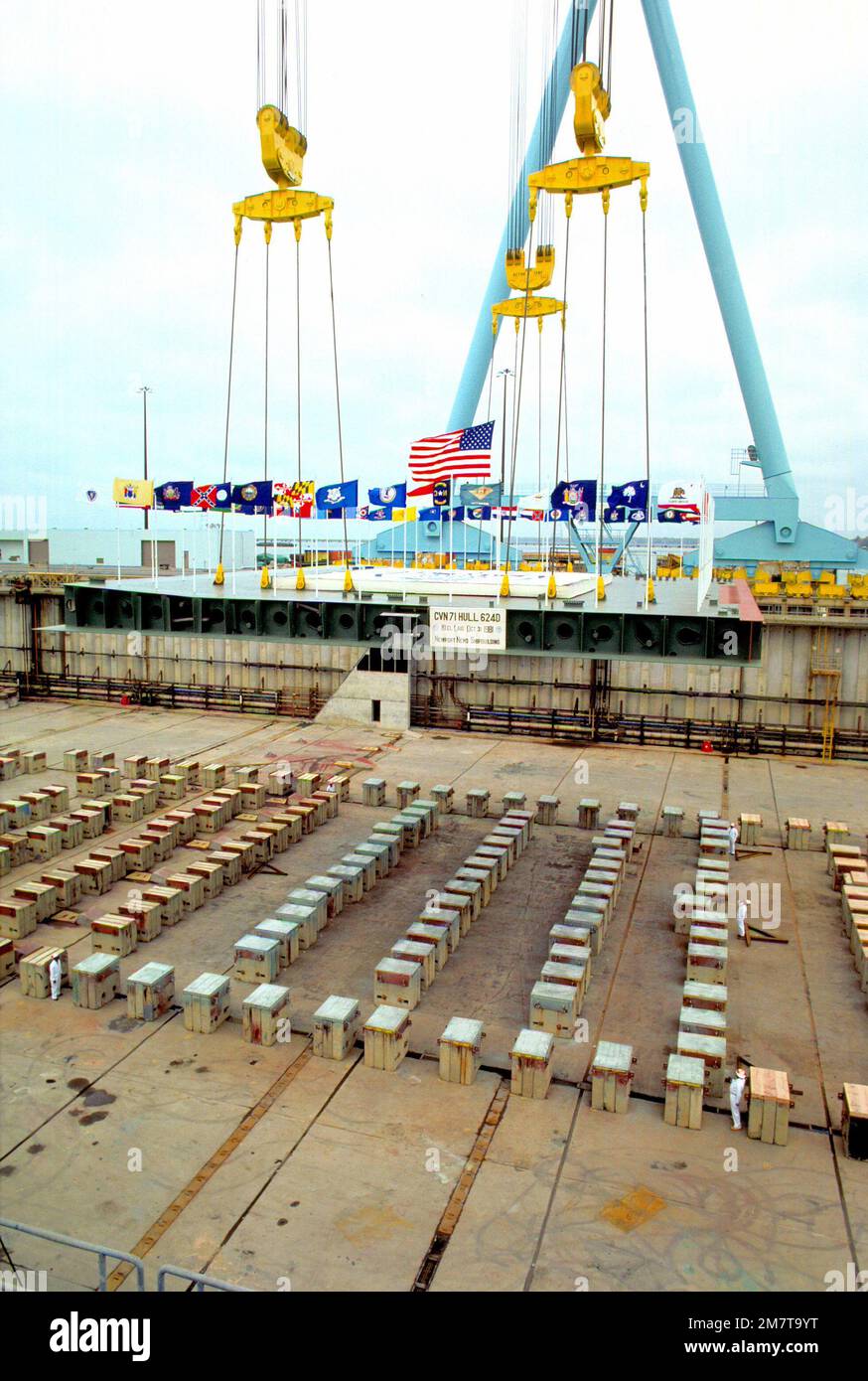 The U.S. flag and state flags line the edge of the first part of the ...