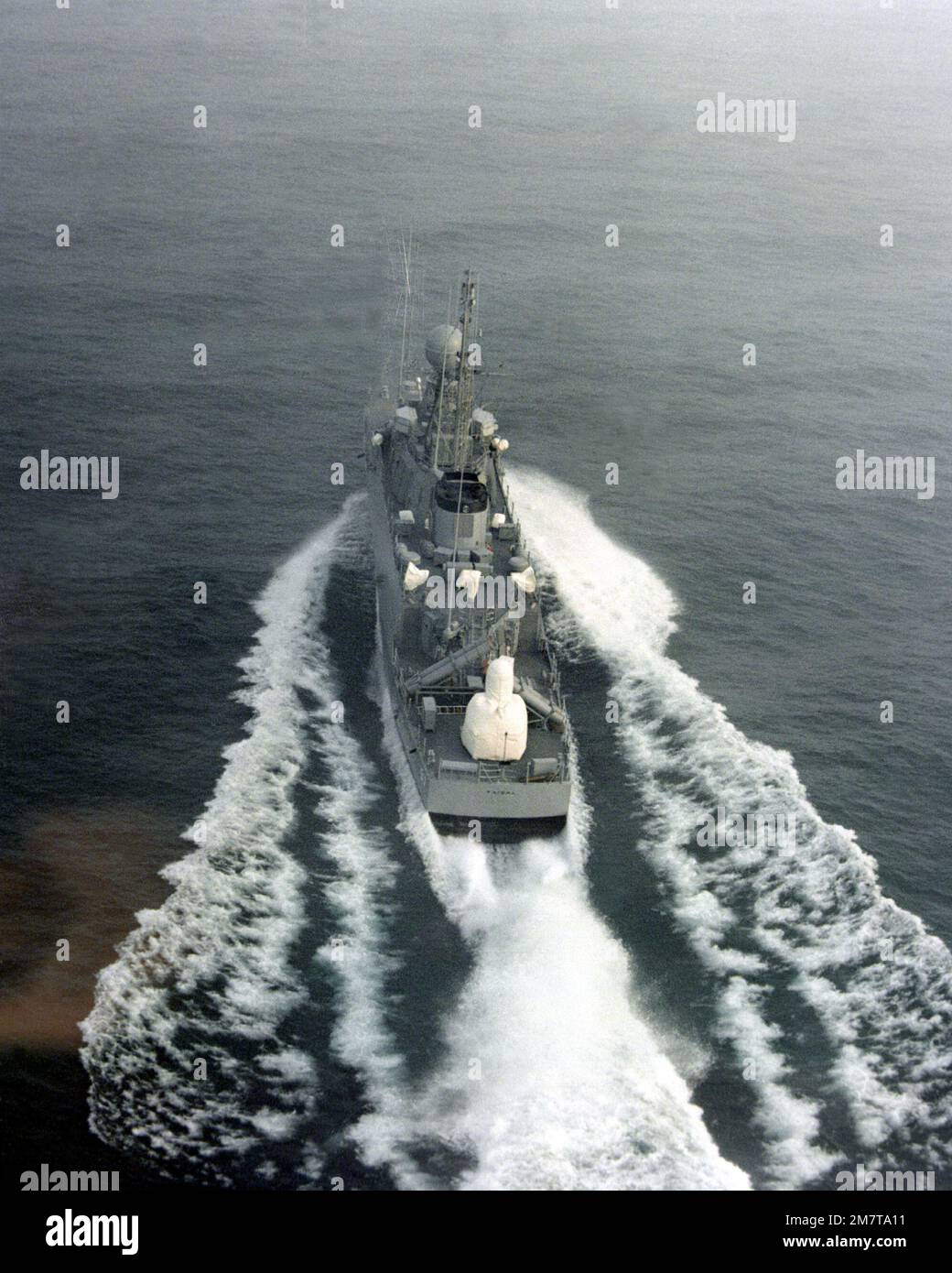 High angle stern view of the patrol gunboat FAISAL (PGG-517) underway ...
