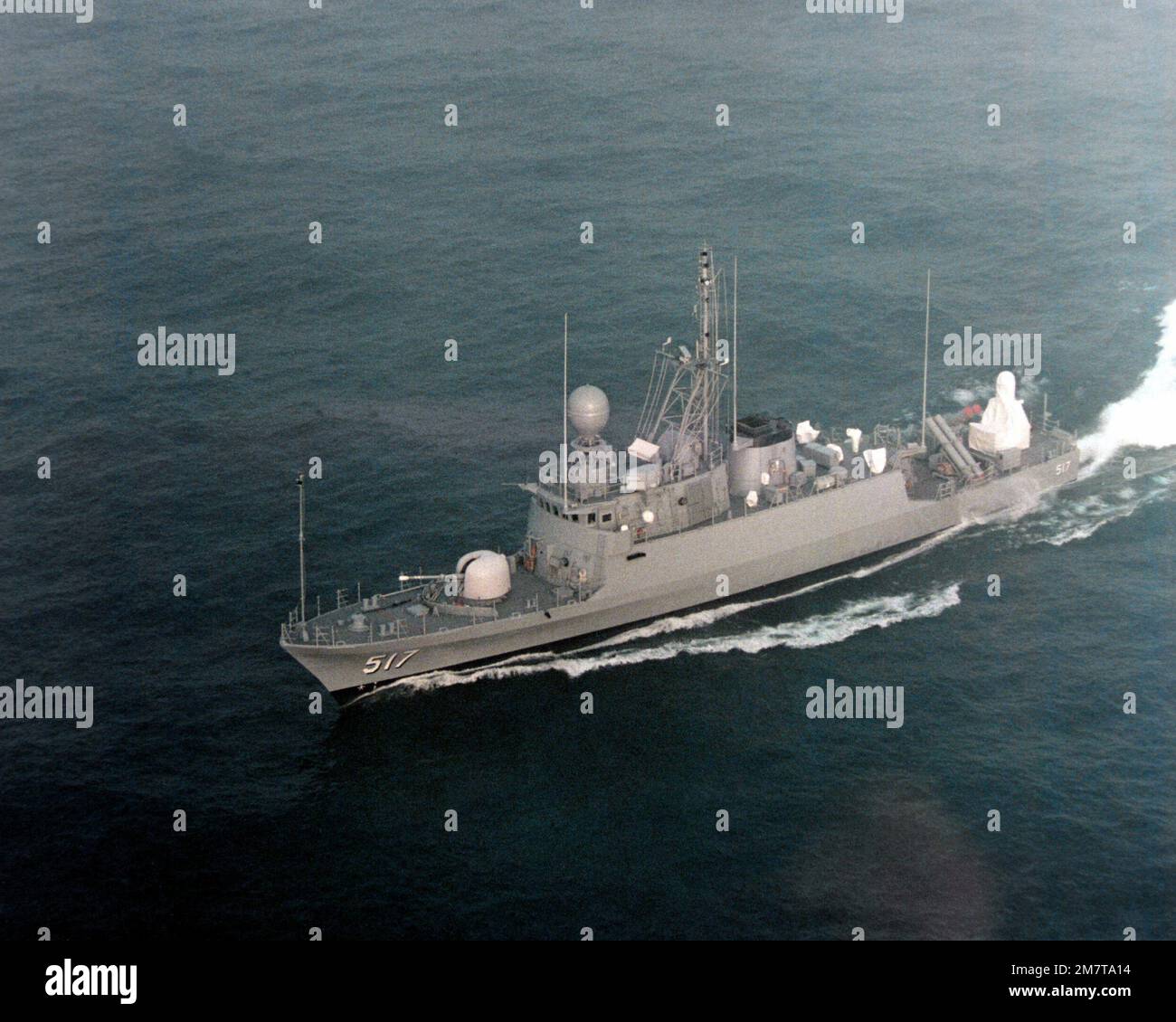 A high angle port view of the patrol gunboat FAISAL (PGG-517) underway ...