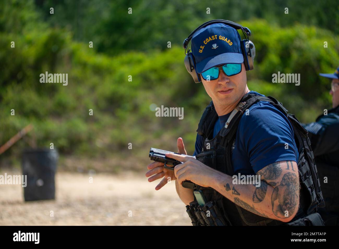 A Coast Guard Maritime Safety and Security Team New Orleans team member ...