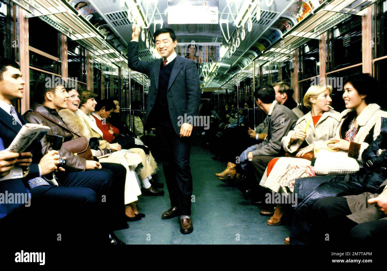 Air Force Academy Cadets ride a subway train with one of their escorts ...