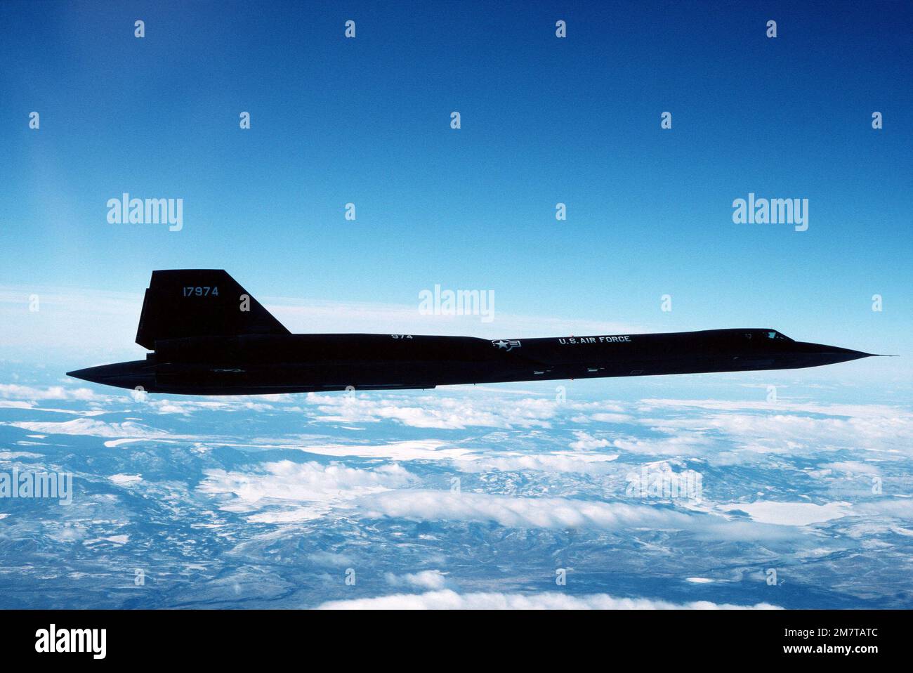 An air-to-air right side view of an SR-71A Black Bird aircraft. Country ...