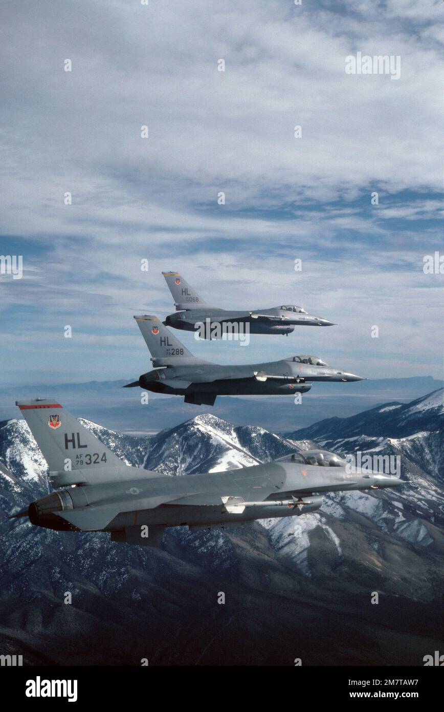 An air-to-air right side view of F-16 Falcon aircraft assigned to the ...