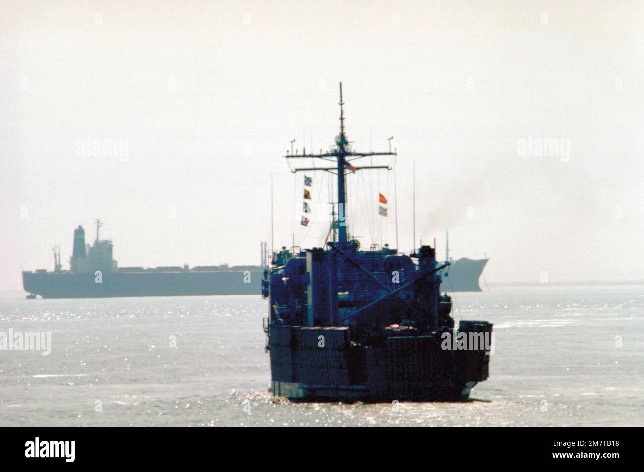 A port quarter view of the tank landing ship USS BARNSTABLE COUNTY (LST ...