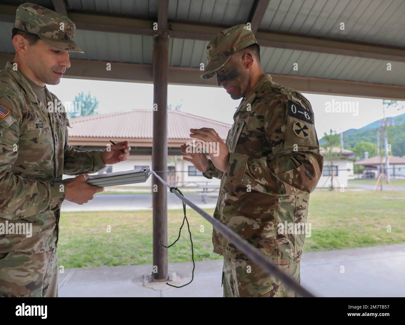 2nd Lt. Christopher Paley (right), assigned to Eighth Army's ...