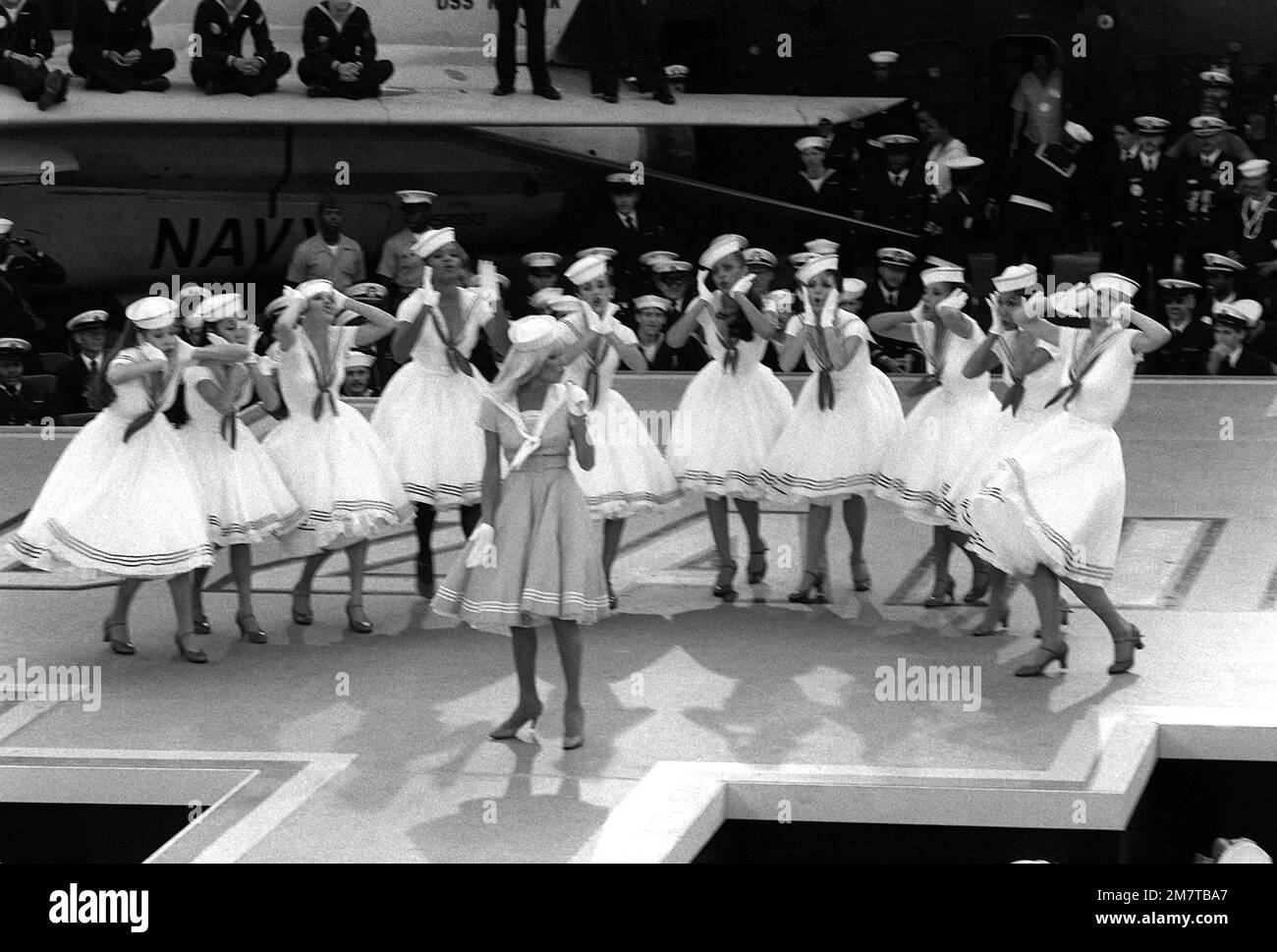 Suzanne Somers, center, performs for the crew aboard the aircraft ...