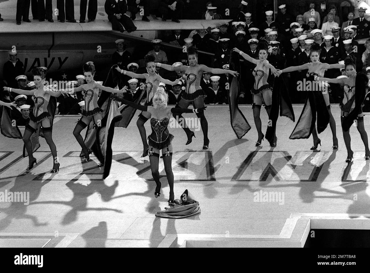Suzanne Somers performs the crew aboard the aircraft carrier USS RANGER ...