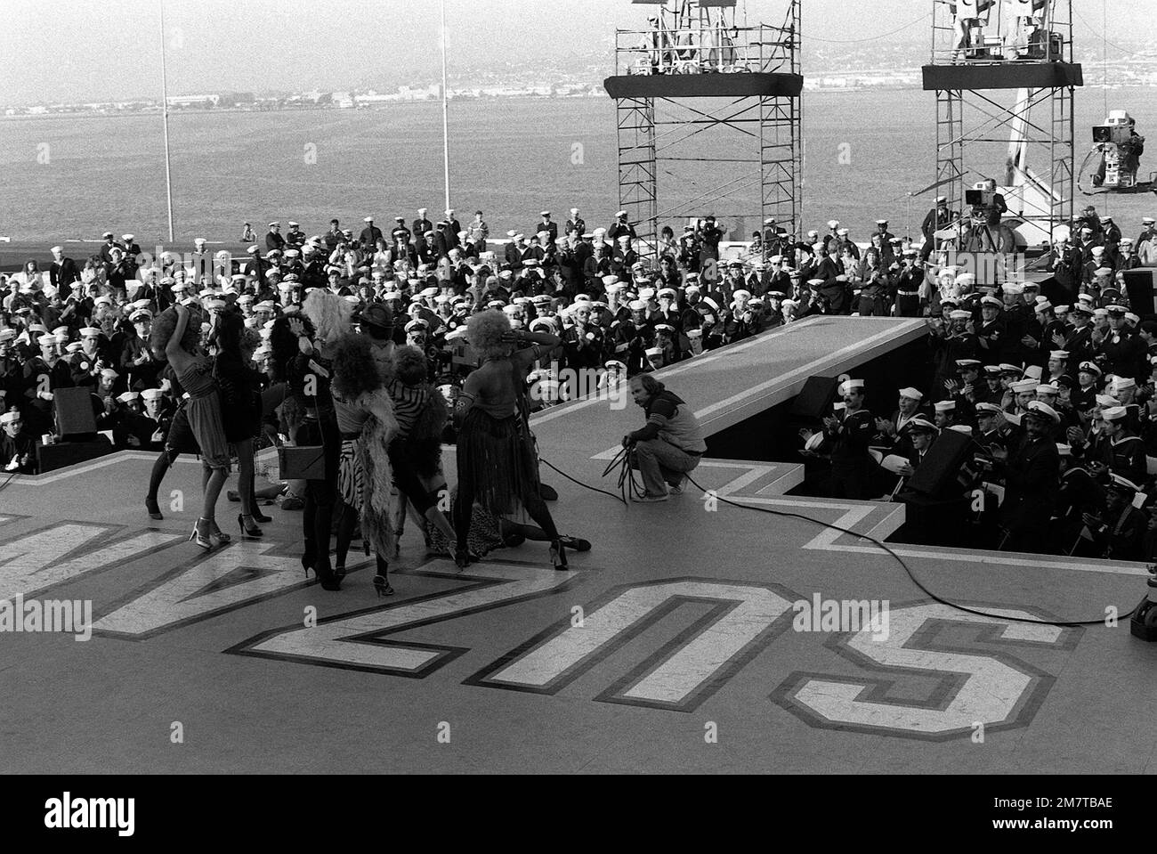 Suzanne Somers and her group perform for the crew of the aircraft ...