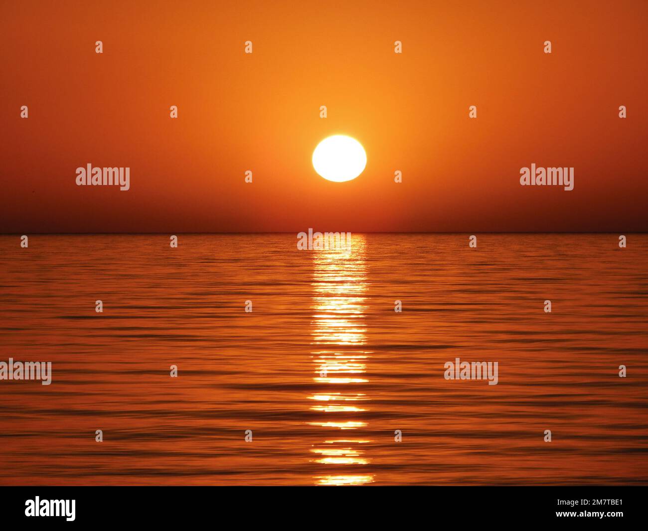 Sunset over the Caspian Sea. Month of September Stock Photo - Alamy