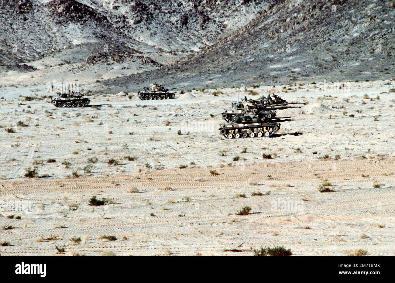 Five M60A1 tanks move into position for an assault on a bunker during ...