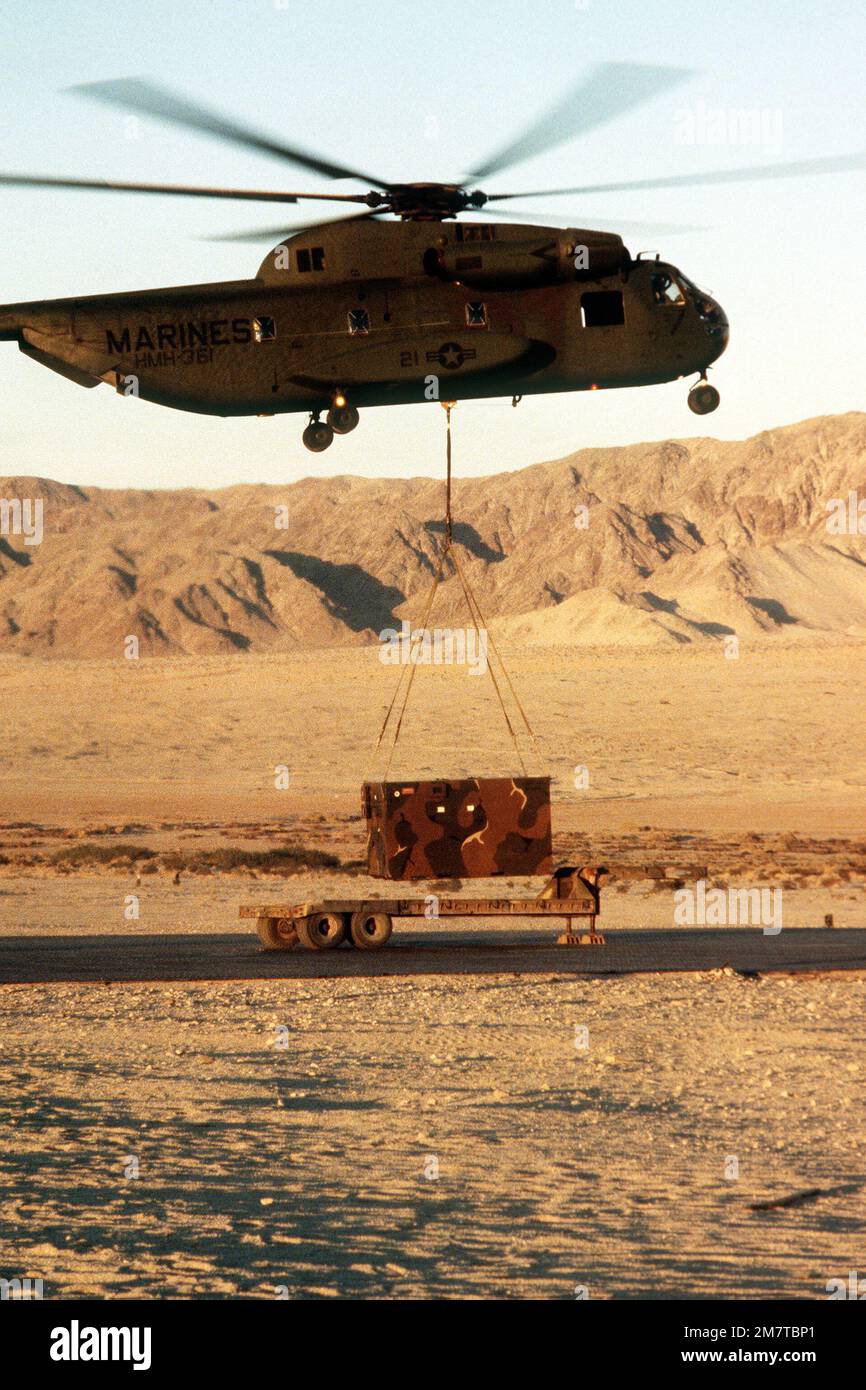 Pilots from Marine Medium Helicopter Squadron 161 (HMM-161) use a CH-53 ...