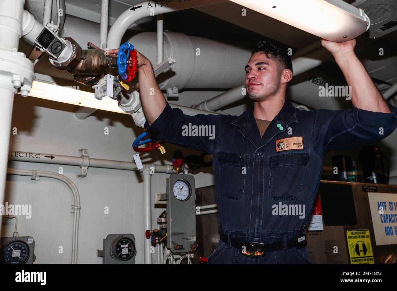 PHILIPPINE SEA (May 13, 2022) Damage Controlman Fireman Nathan Guzman ...
