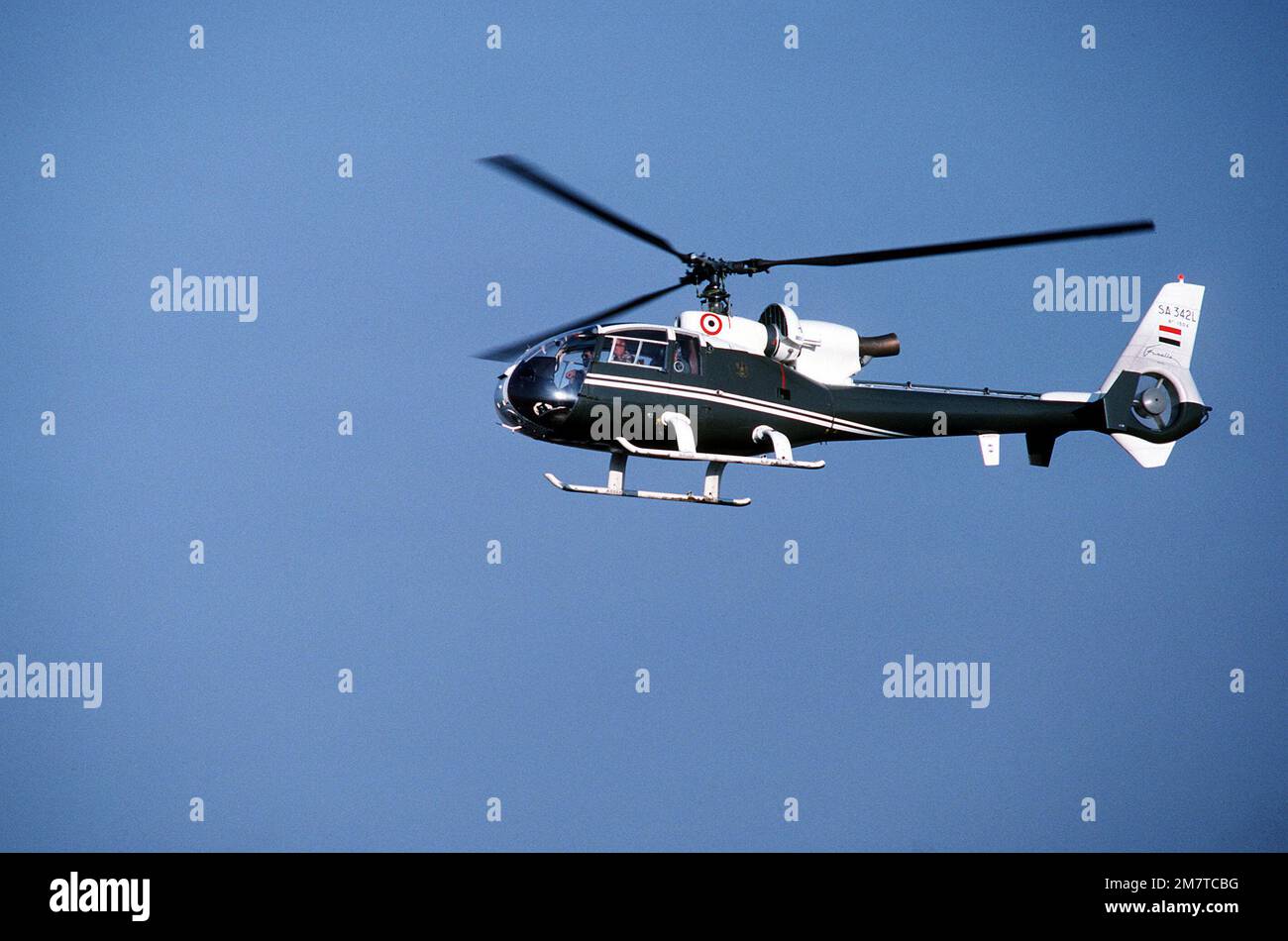 Left side air-to-air view of an SA-342 Gazelle aircraft during exercise ...