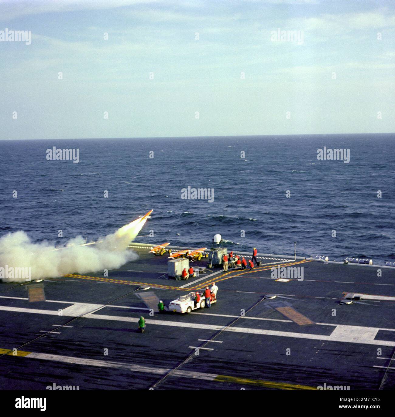 A MQM-74C target drone is launched from the flight deck during a ...