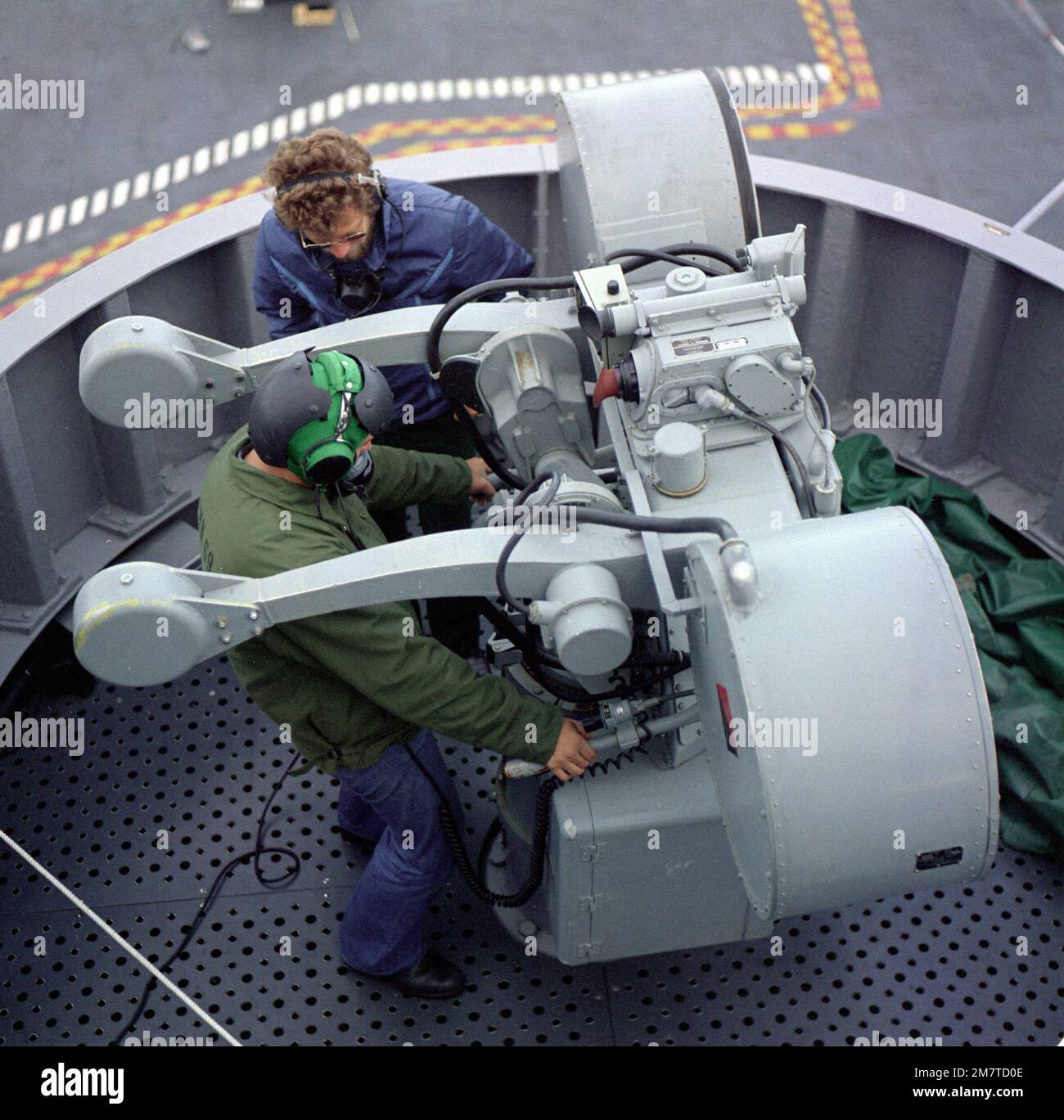 A gunner's mate mans the Mark 115 Sea Sparrow fire control system ...