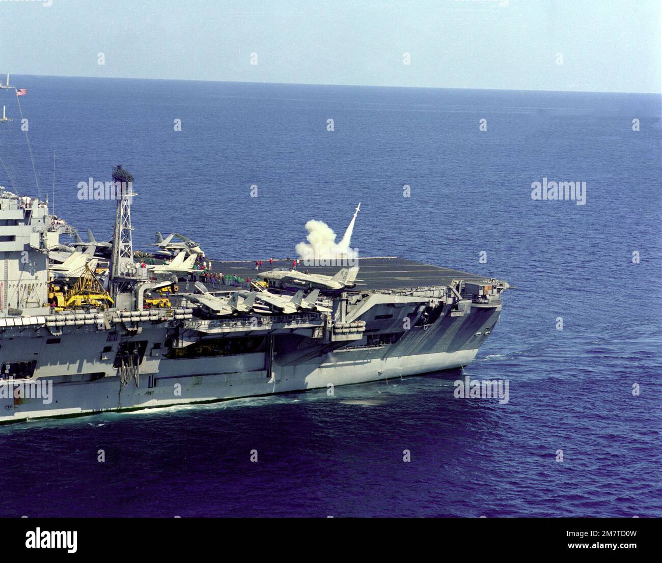 A RIM-7 Sea Sparrow missile is launched during a missile firing ...