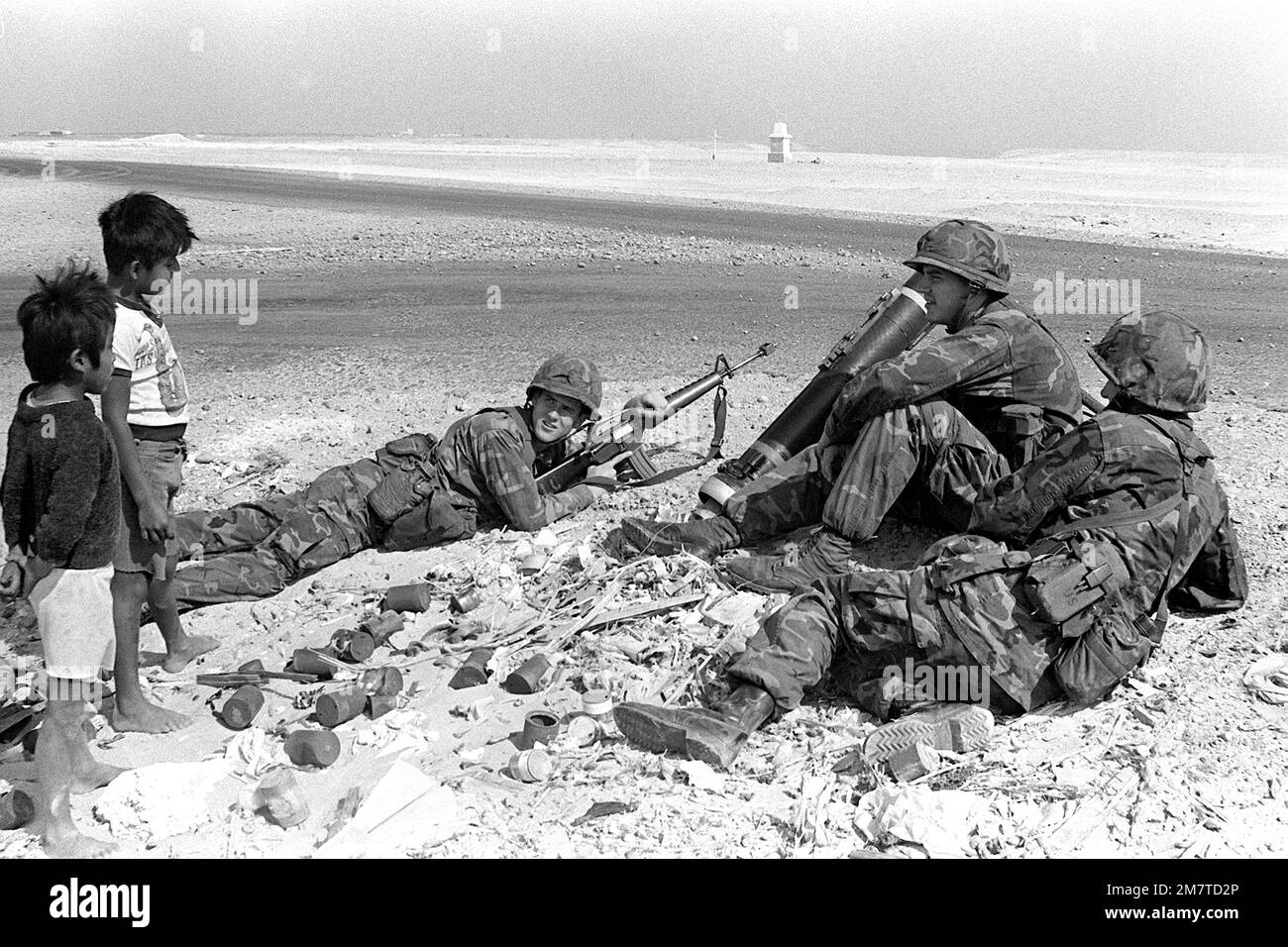 Three U.S. Marines of Co. K, 3rd Bn., 6th Mar., talk to two Peruvian ...