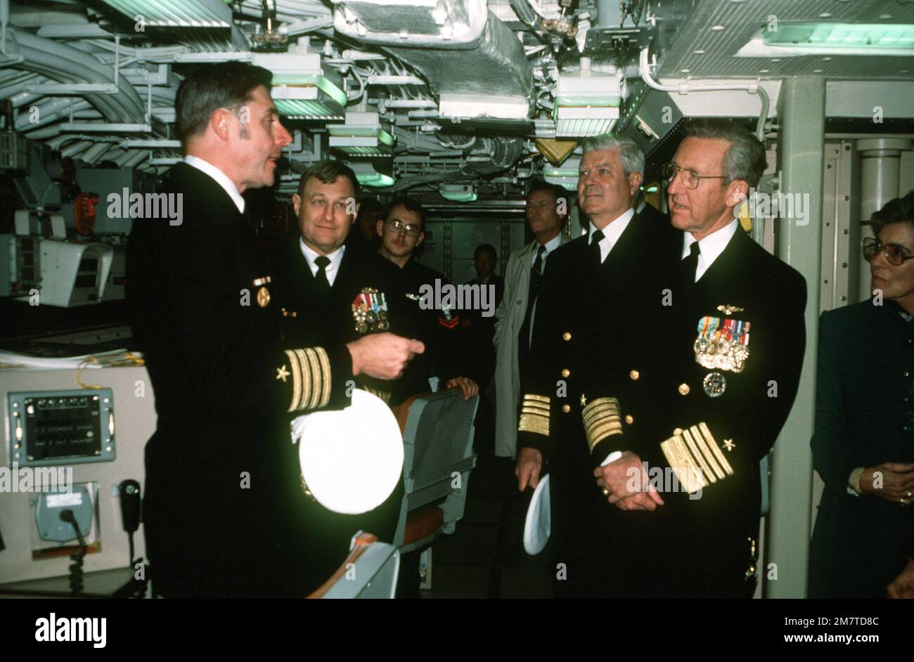 CAPT Arlington F. Campbell, left, commanding officer (gold crew), gives ...