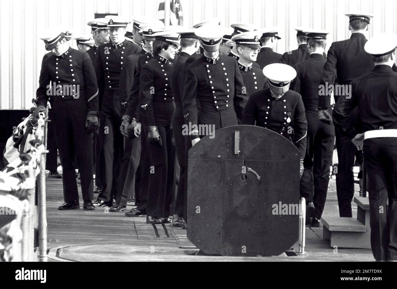 Members of the Midshipmen Drum and Bugle Corps, near the hatch on the ...