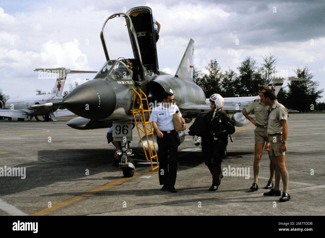 An Australian pilot is welcomed by officers participating in Exercise ...