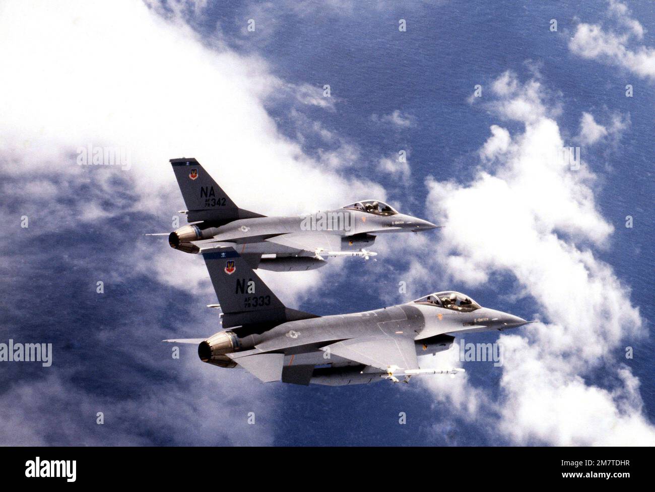 Near Hawaii. A right rear view of two F-16 Fighting Falcon aircraft ...