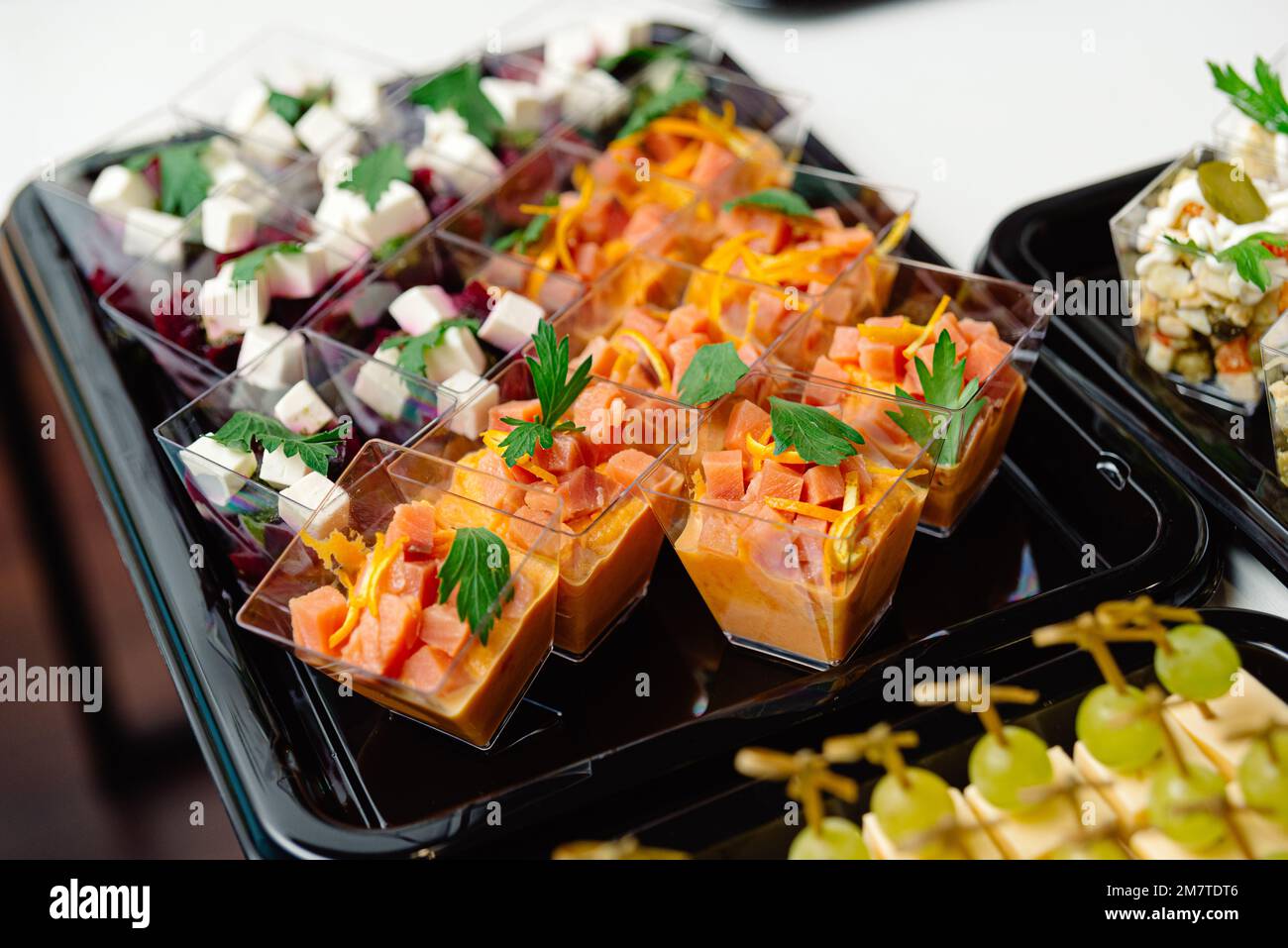 catering delivery tray servings of salads in plastic containers ...