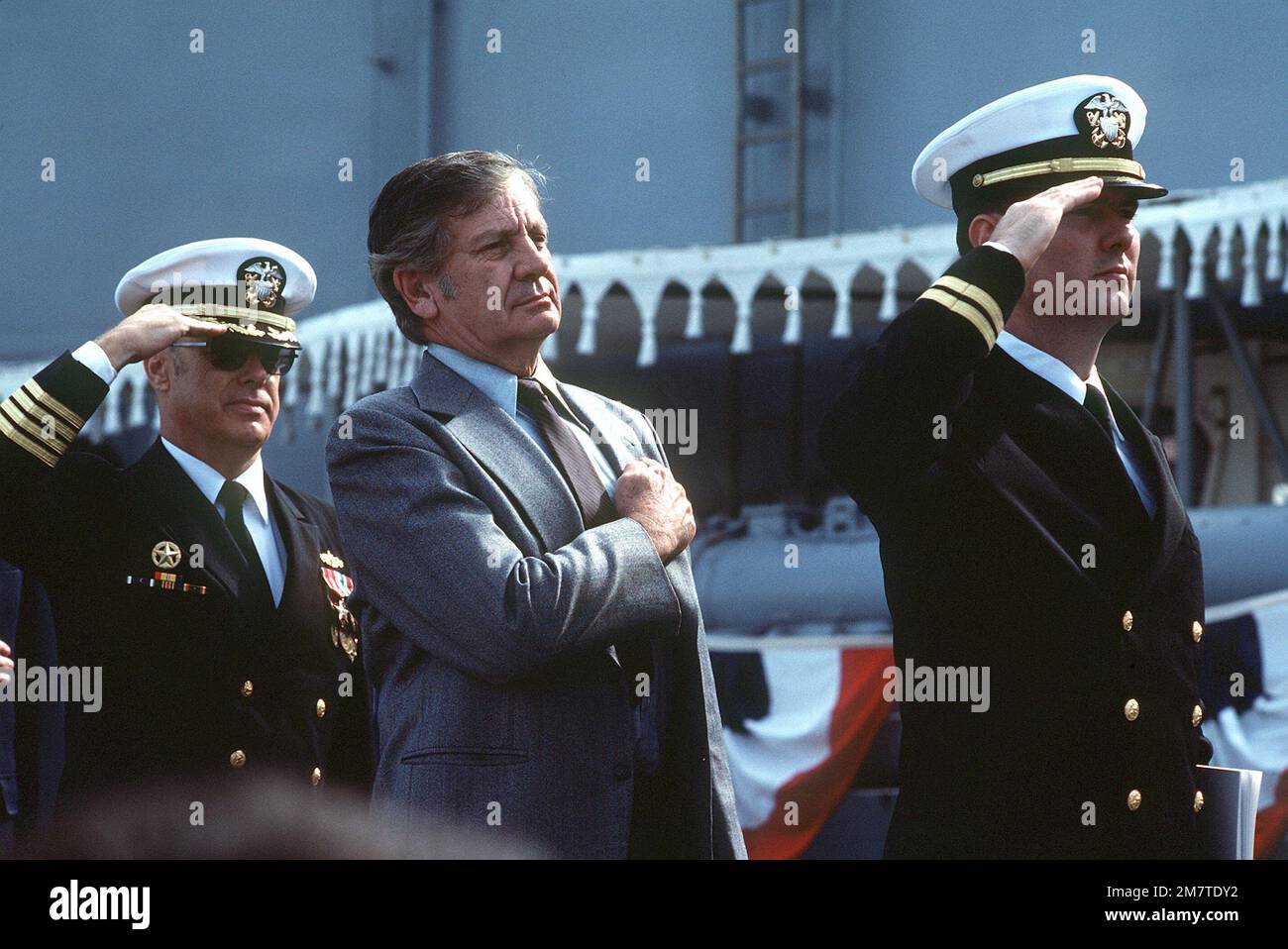 (L-R) CAPT. Earl Russell, commander, Destroyer Squadron Nine, Mr. G. C ...