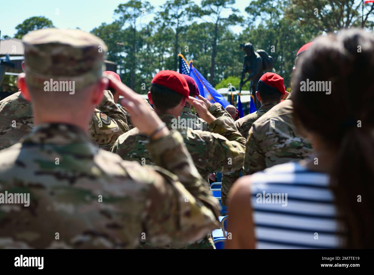 Past and present special tactics operators, salute the flag during the ...