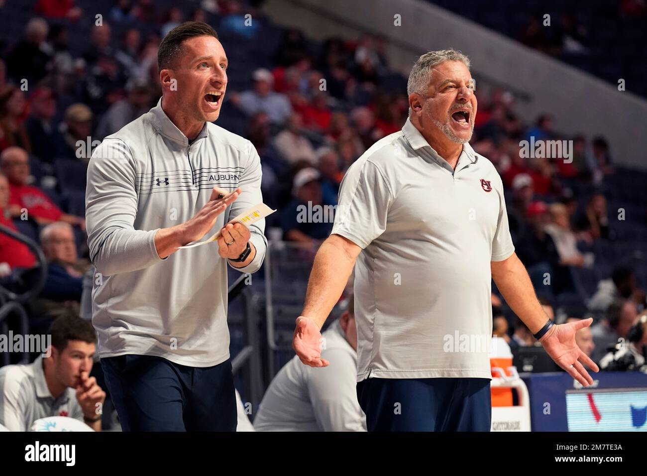 Auburn head coach Bruce Pearl, right, and his son, assistant coach ...