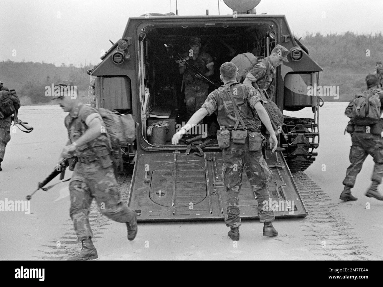 U.S. Marines of Co. K, 3rd Bn., 6th Marines, exit from an LVTP-7 ...
